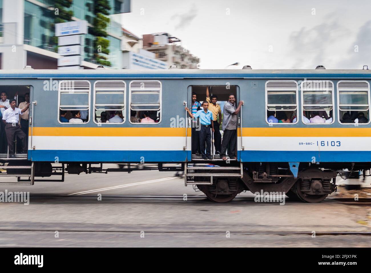 COLOMBO, SRI LANKA - JULY 26, 2016: Suburban train rides through ...