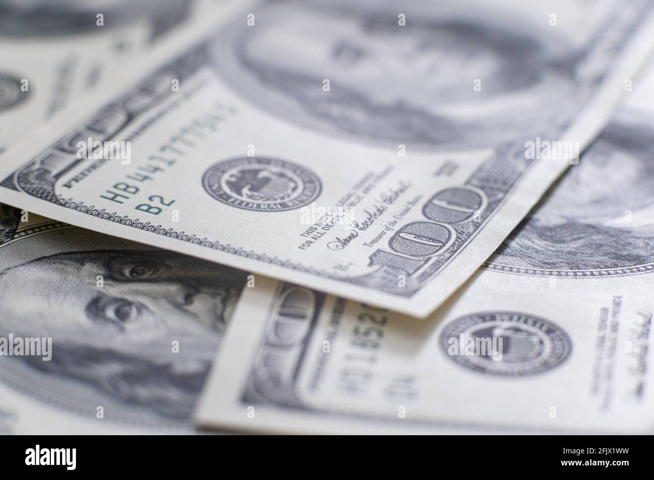 Cash money in a large pile as a finance background. Paper money close ...