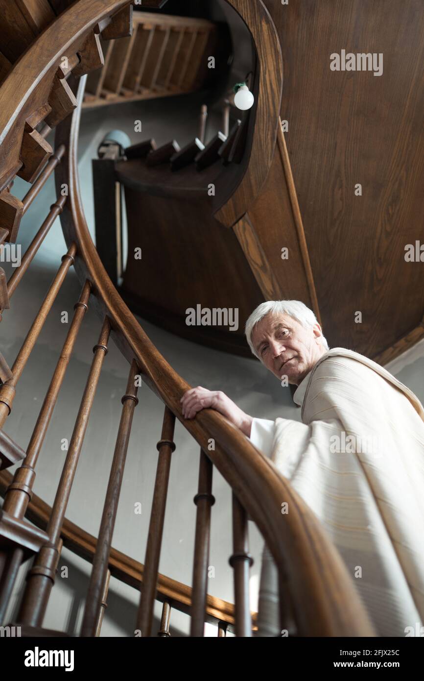 Priest looking hi-res stock photography and images - Alamy