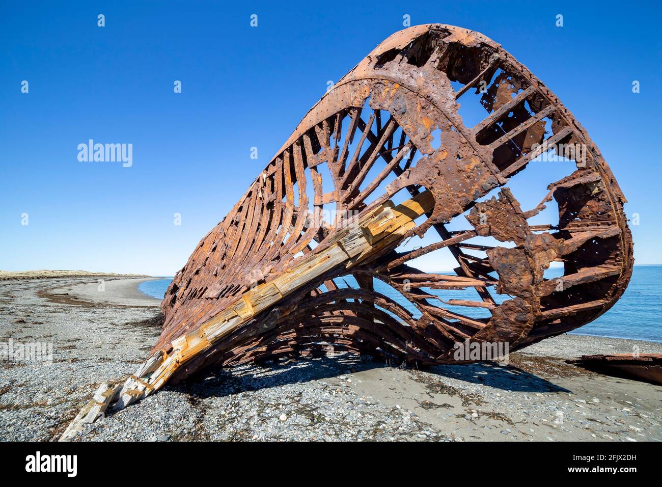 Wreckages, abandoned rusty stranded boat on San Gregorio beach in the ...