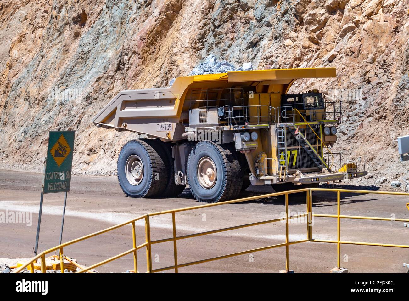 Big haul truck and machinery working in Chuquicamata, biggest open pit ...