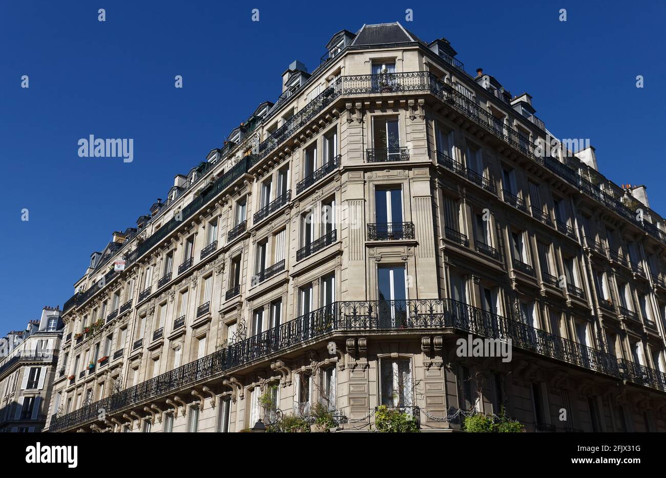 Traditional French house with typical balconies and windows. Paris ...