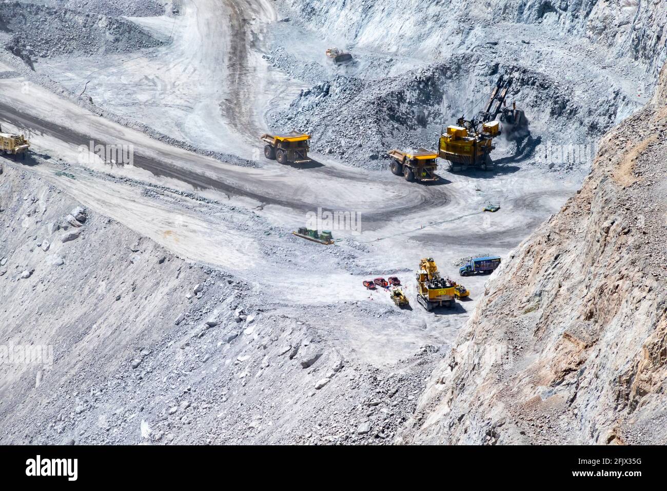 Big haul truck and machinery working in Chuquicamata, biggest open pit ...