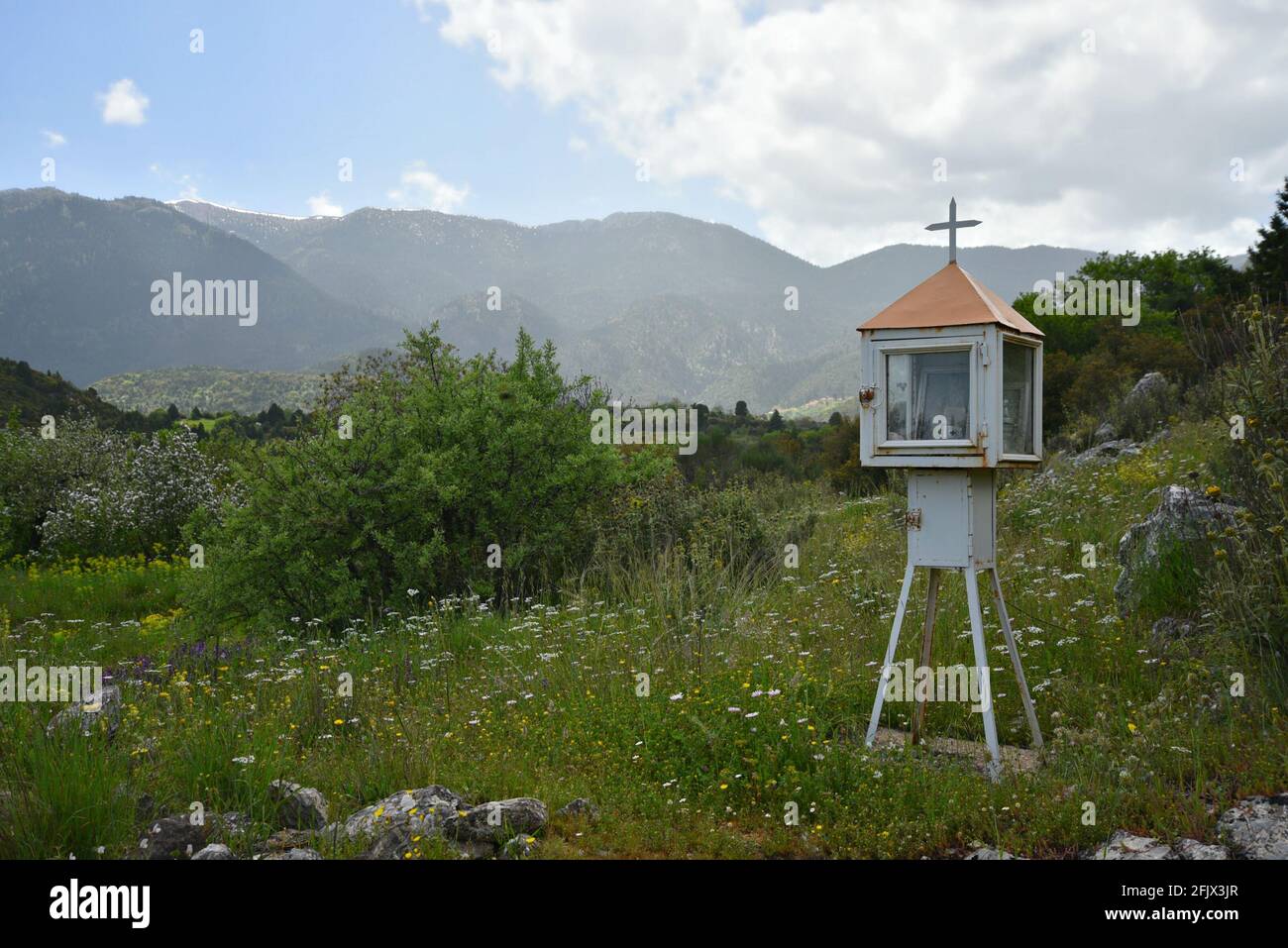 Traditional Greek Orthodox roadside memorial in the countryside of ...