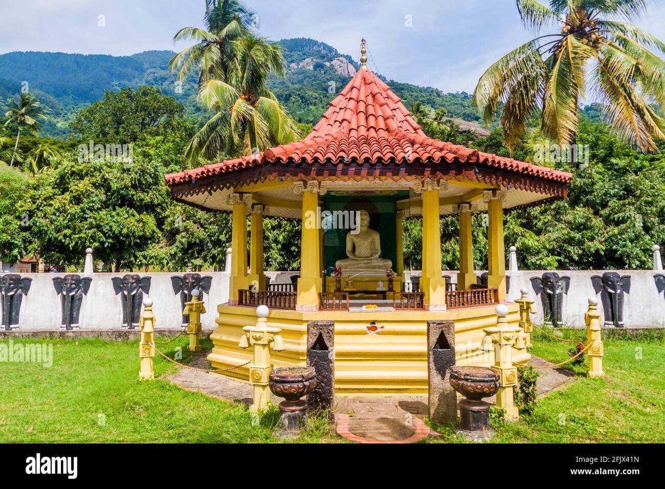 Buddhist shrine in front of Aluvihare Rock Temple, Sri Lanka Stock ...