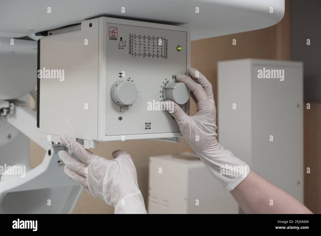 The work of a radiologist in the X-ray room for diagnostics Stock Photo ...