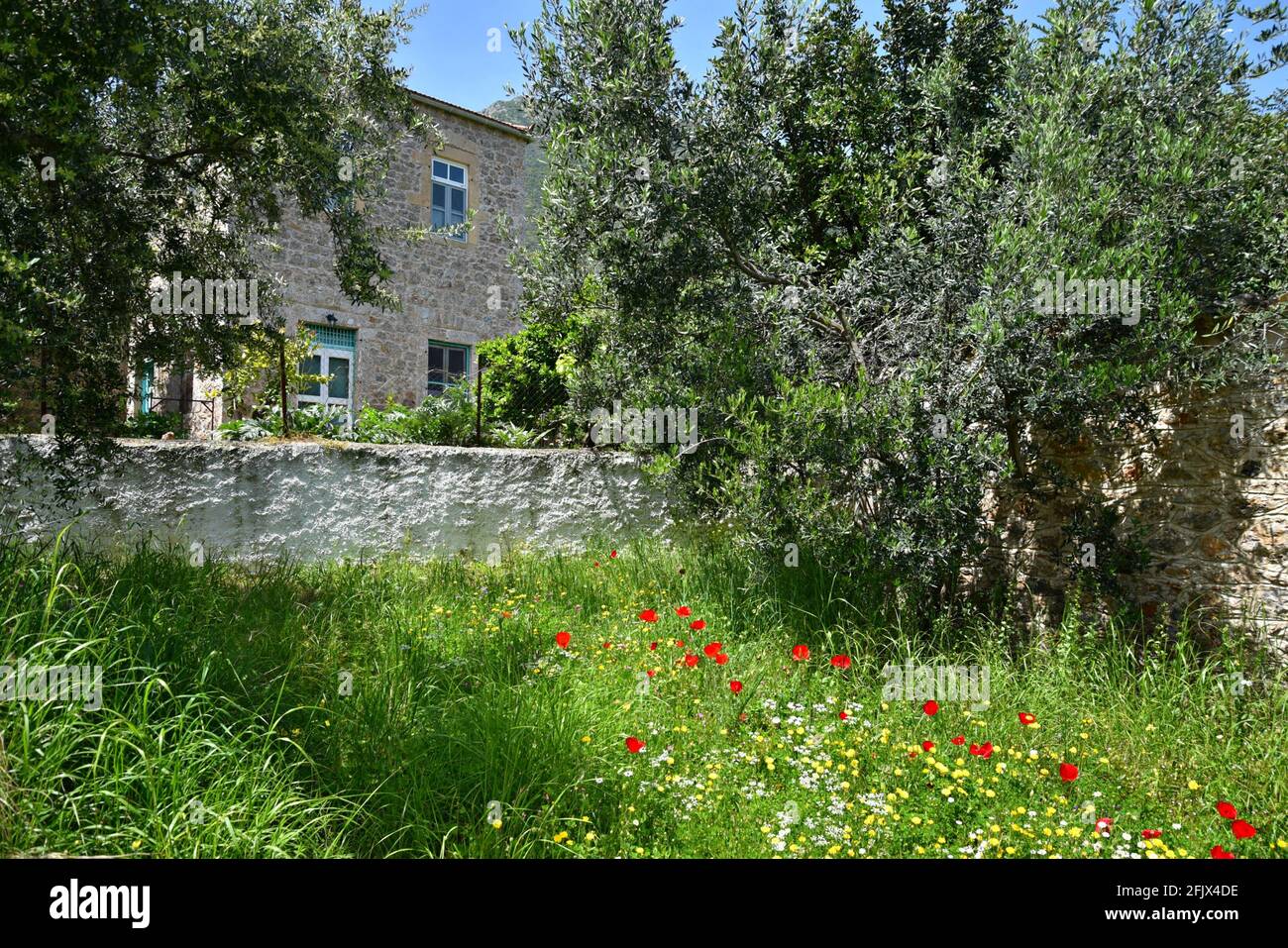 Handcrafted stone built house facade in the countryside of Poulithra, a ...