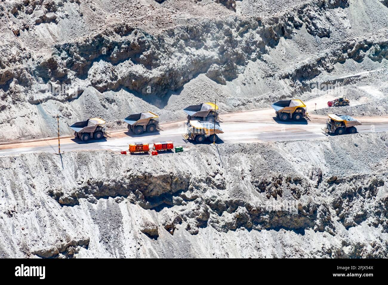 Big haul truck and machinery working in Chuquicamata, biggest open pit ...