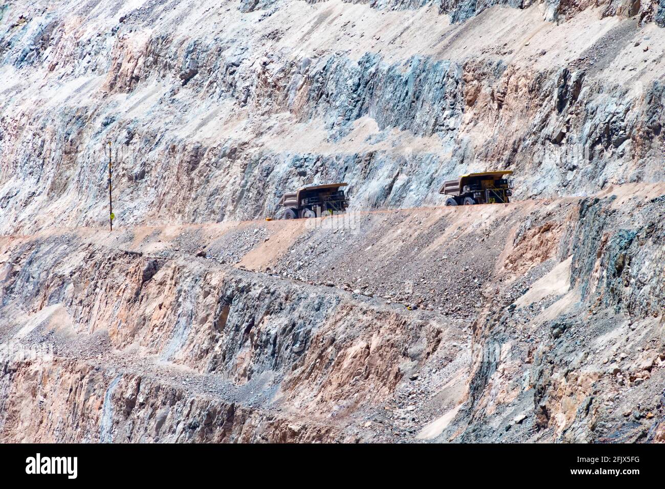 Big haul truck and machinery working in Chuquicamata, biggest open pit ...