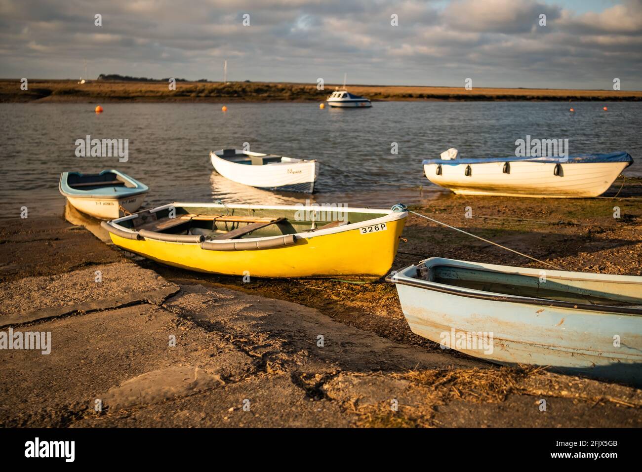Small boats moored in Wells-Next-The-Sea estuary on the North Norfolk ...