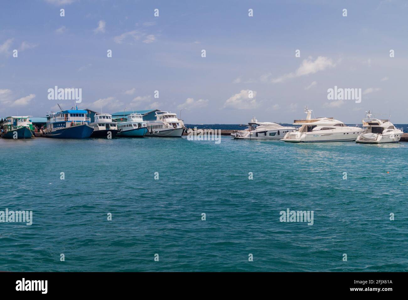 MALE, MALDIVES - JULY 11, 2016: Yachts in President's Jetty in Male ...