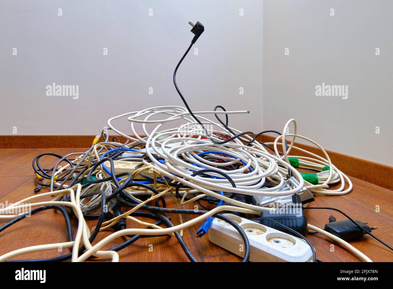 Tangled electrical cords hi-res stock photography and images - Alamy