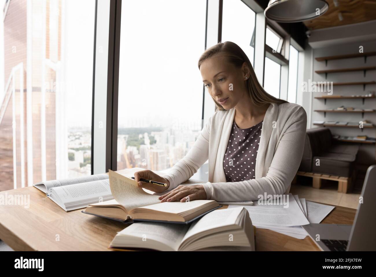 Teen female study with textbooks at home Stock Photo - Alamy