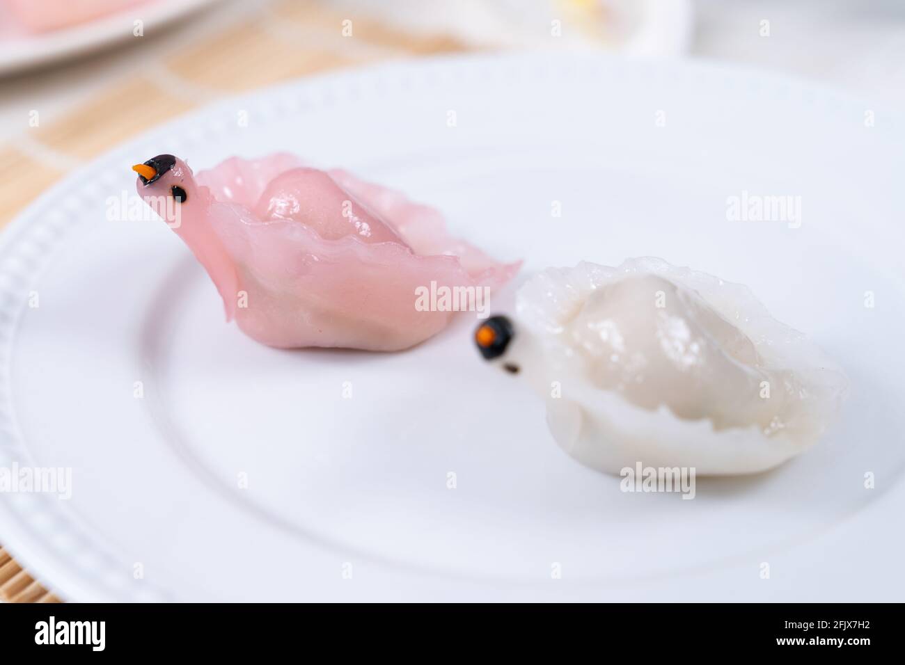 Chinese Har Gao Dim Sum dumplings in the shape of a swan Stock Photo ...
