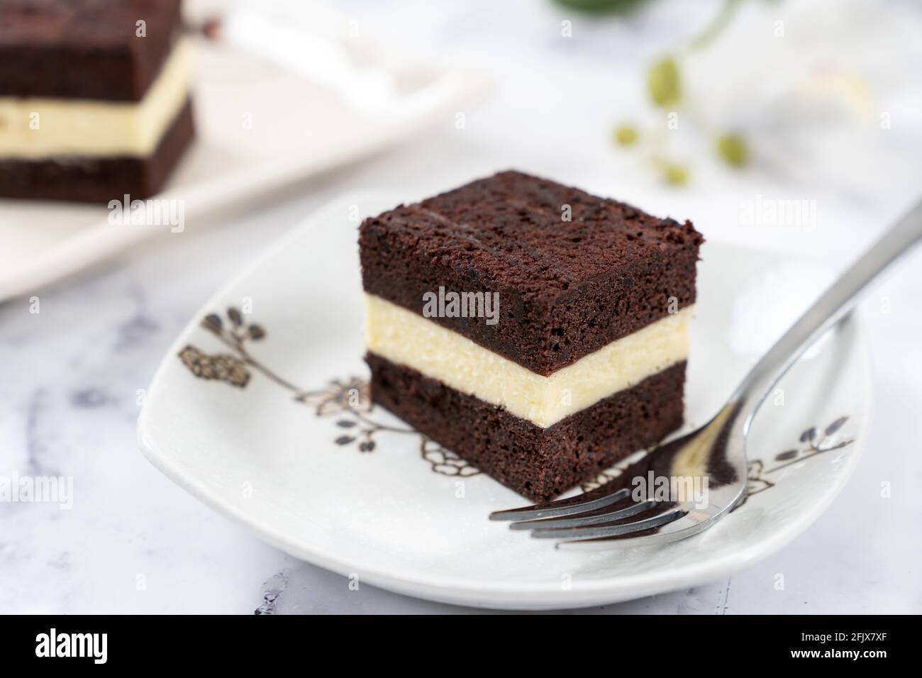 Homemade three layer steam chocolate cheese cake Stock Photo - Alamy