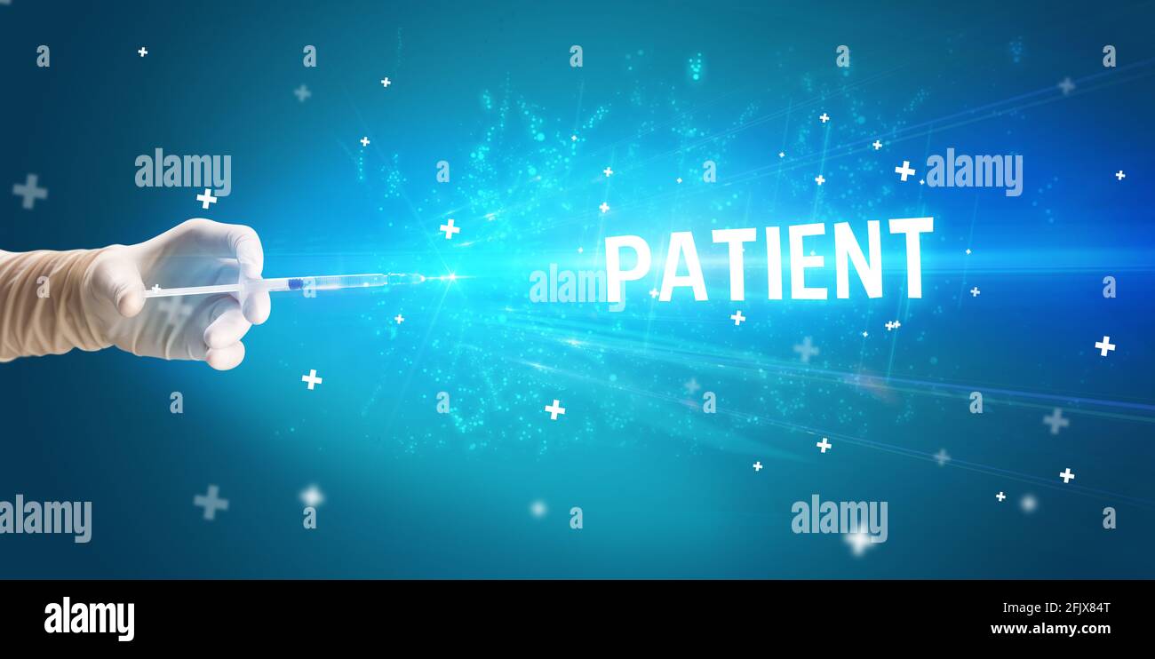 Syringe, medical injection in hand Stock Photo - Alamy