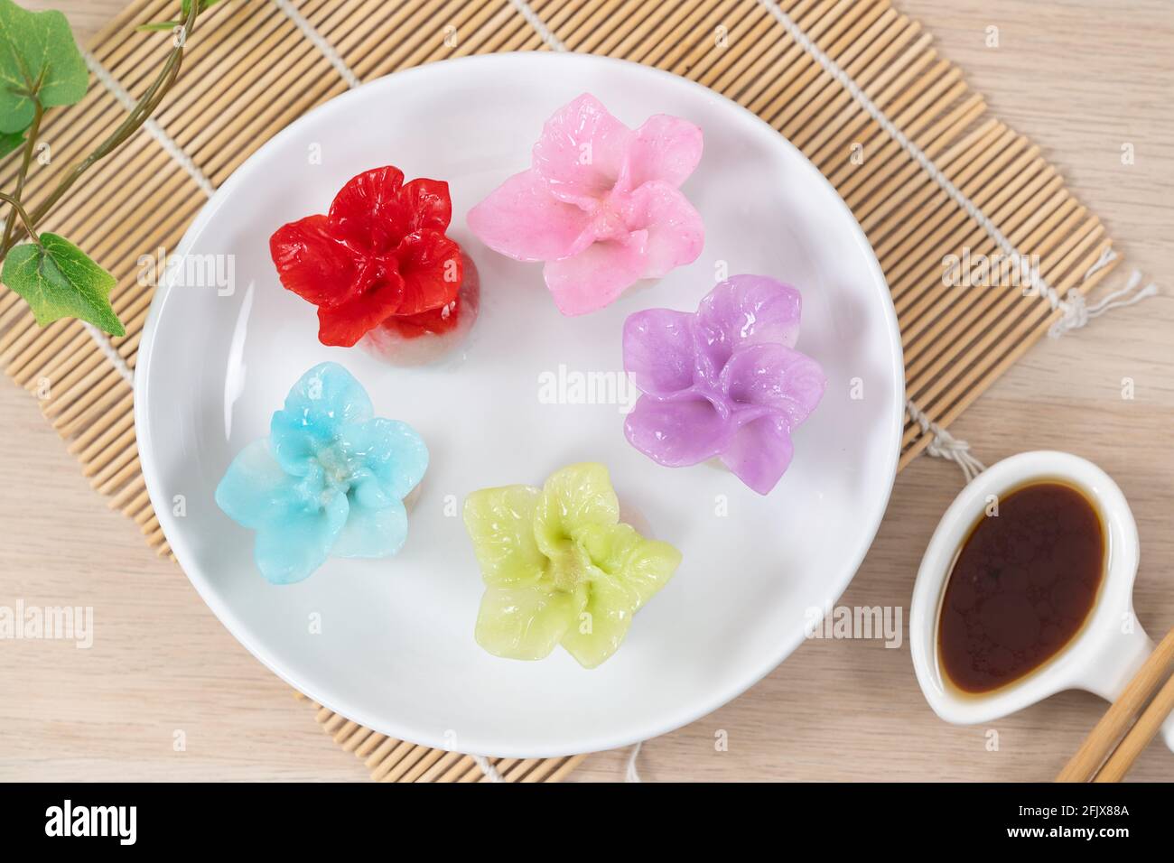 Chinese style colorful flower dumplings or dim sum Stock Photo - Alamy