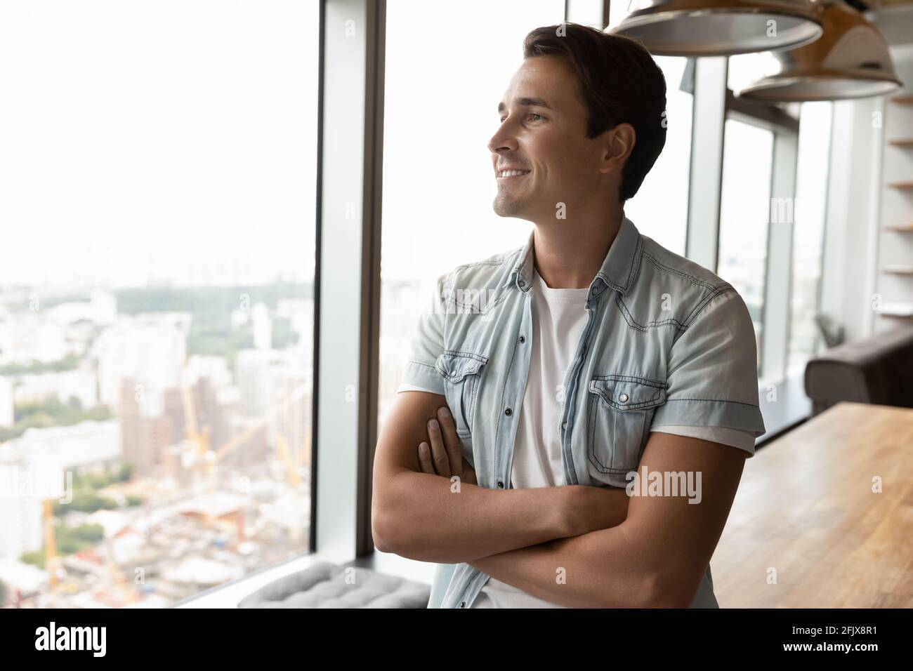 Smiling businessman look in distance planning career perspectives Stock ...