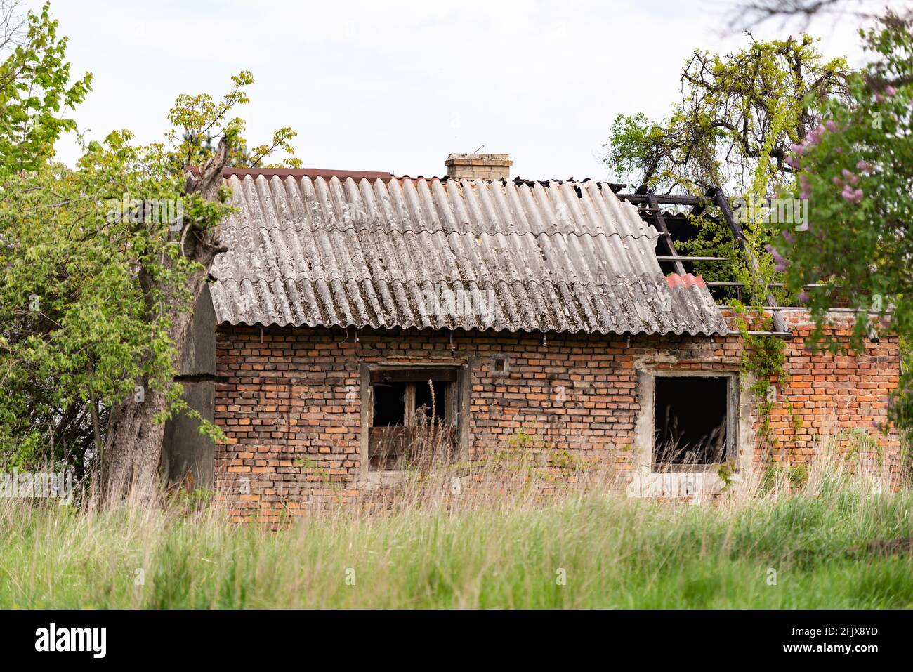 Old village house near Krakow. Abandoned brick house after fire. Old ...