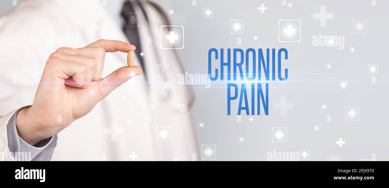 Close-up of a doctor giving a pill Stock Photo - Alamy