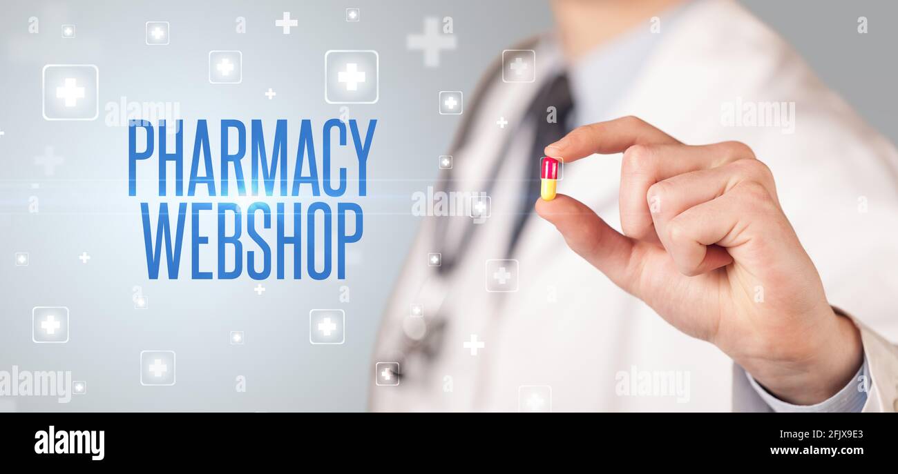 Close-up of a doctor giving a pill Stock Photo - Alamy