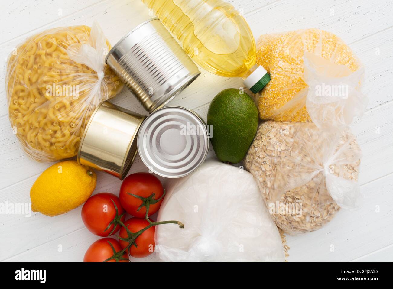 Food donations on wooden background, top view with copy space Stock ...