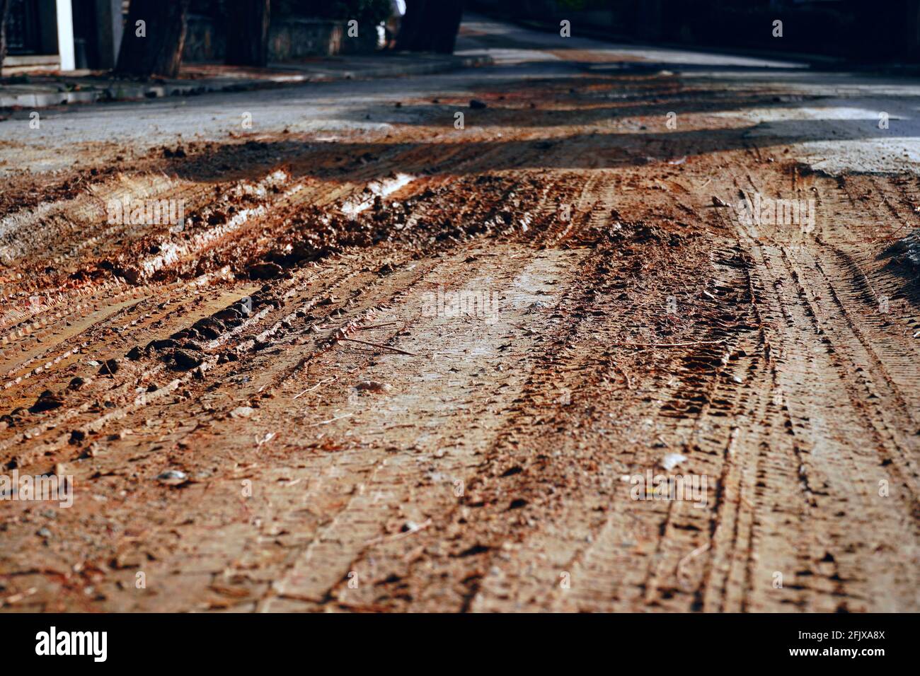 Dirt on the ground with tire marks Stock Photo - Alamy