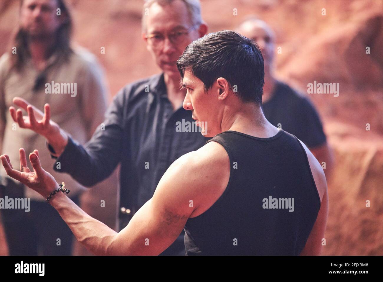 MORTAL KOMBAT, from left: director Simon McQuoid, Lewis Tan, on set, 2021. ph: Simon Westlake ...