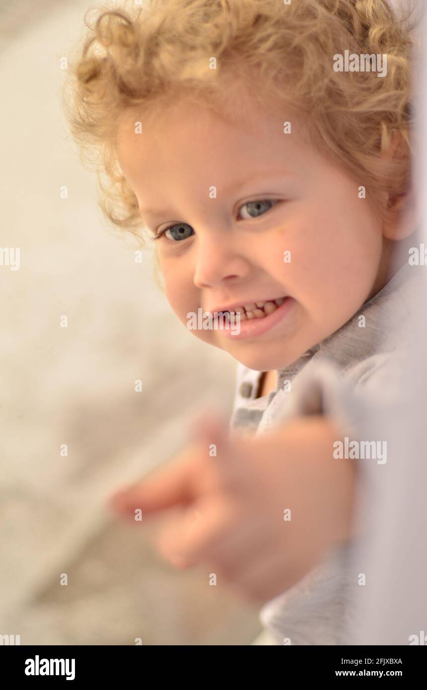 boy near the window, close-up Stock Photo - Alamy