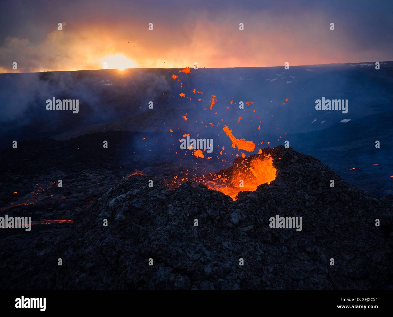Volcanic terrain with burning hot lava Stock Photo - Alamy