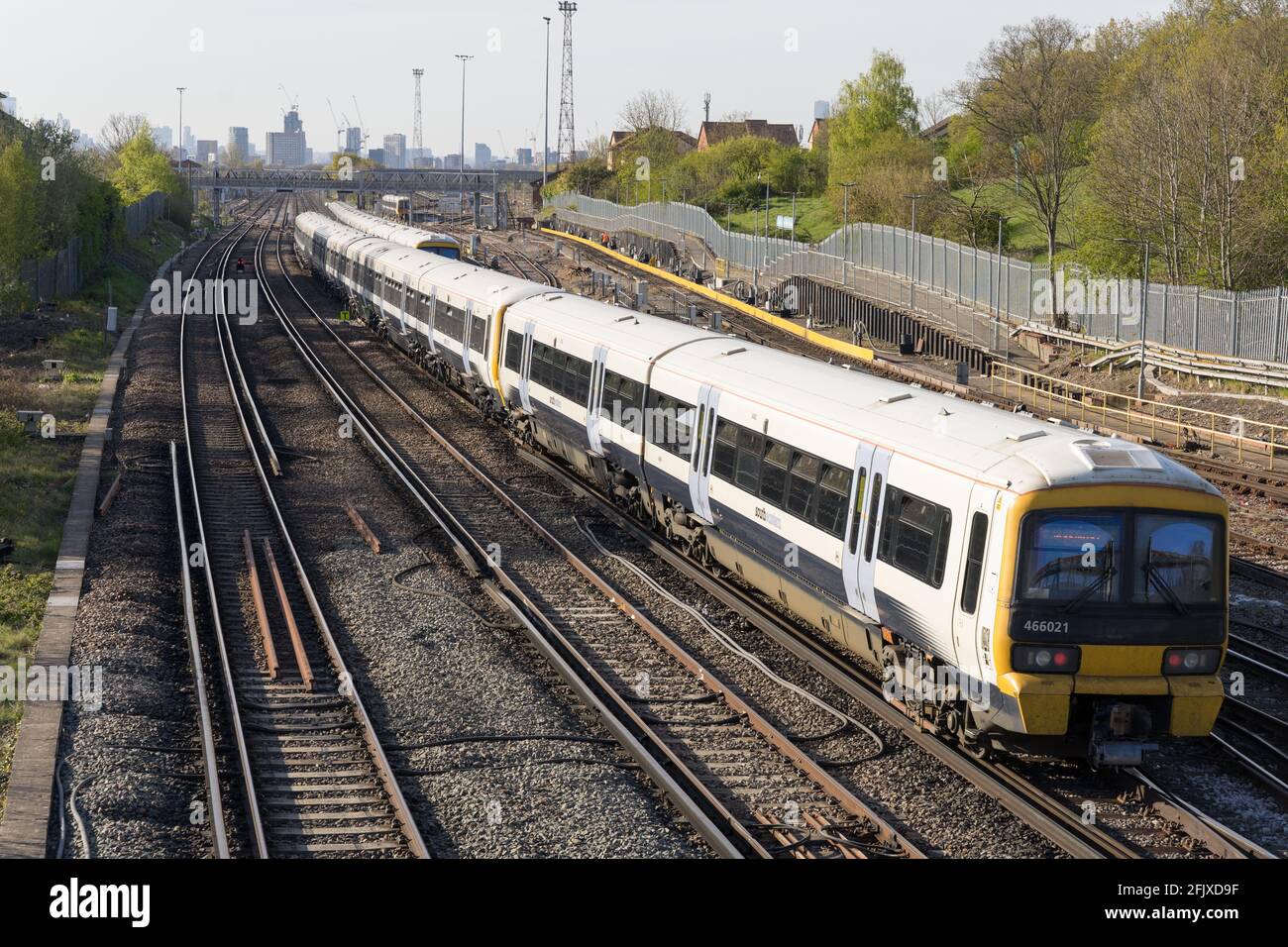 Commuter train travelling on network rail out of central London, train ...
