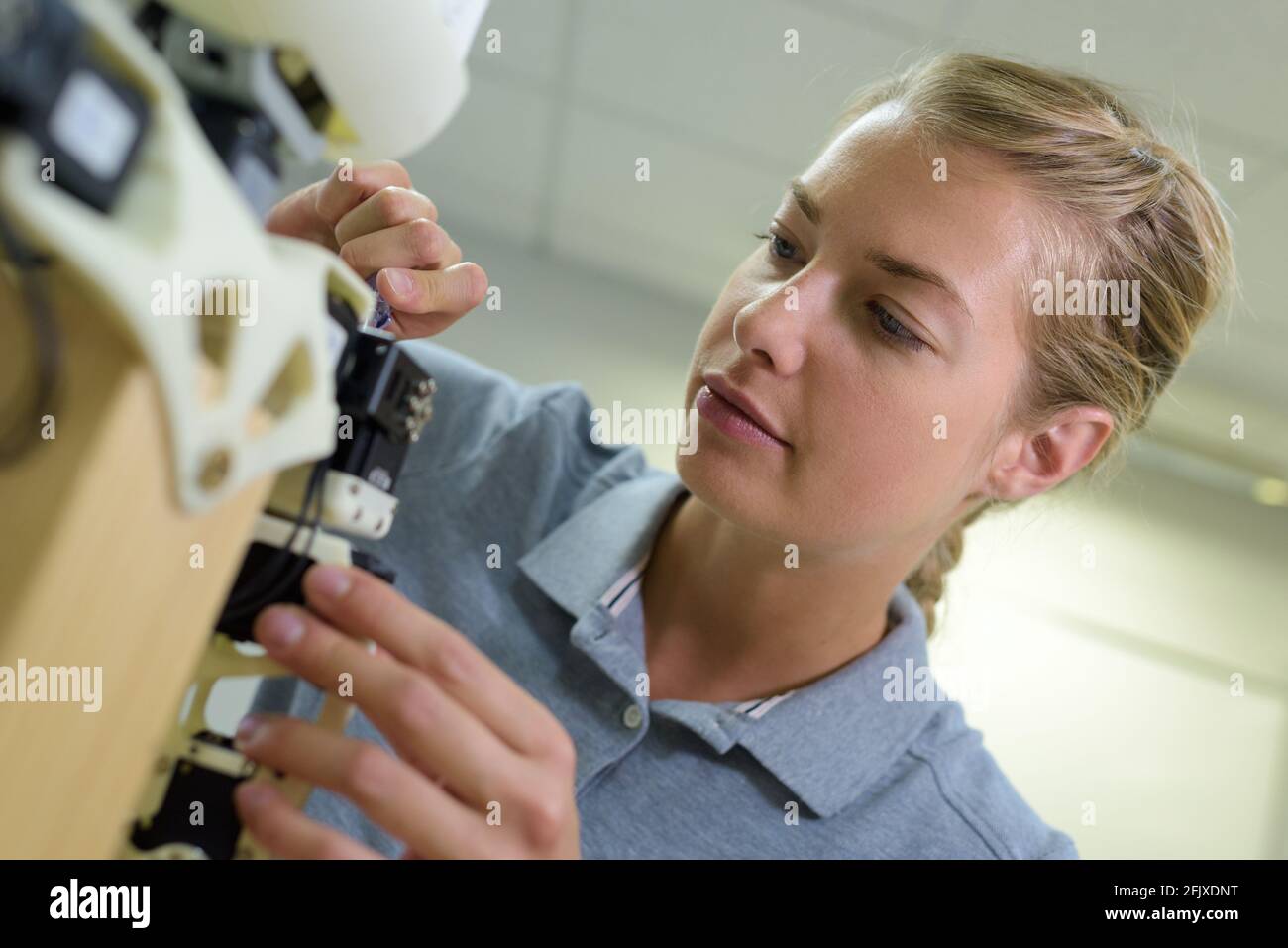 a woman in electronics workshop Stock Photo - Alamy