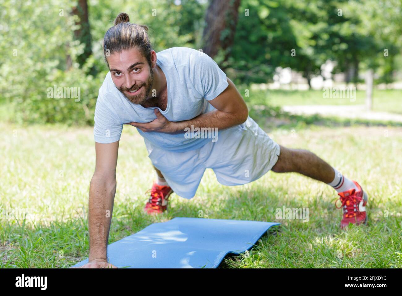 male doing a plank exercise Stock Photo - Alamy