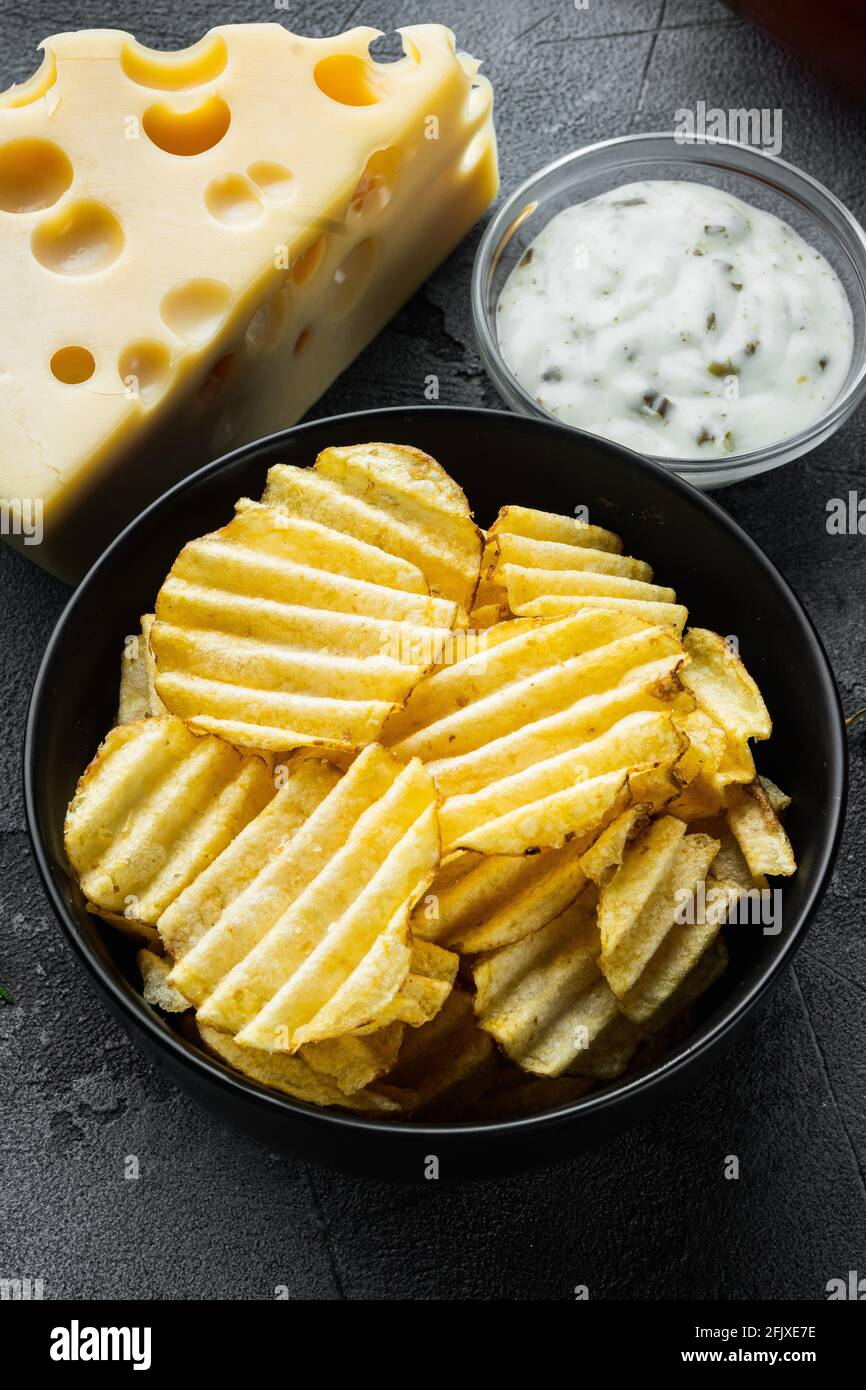 Crispy potato chips set with Cheese and Onion, with dipping sauces, on ...