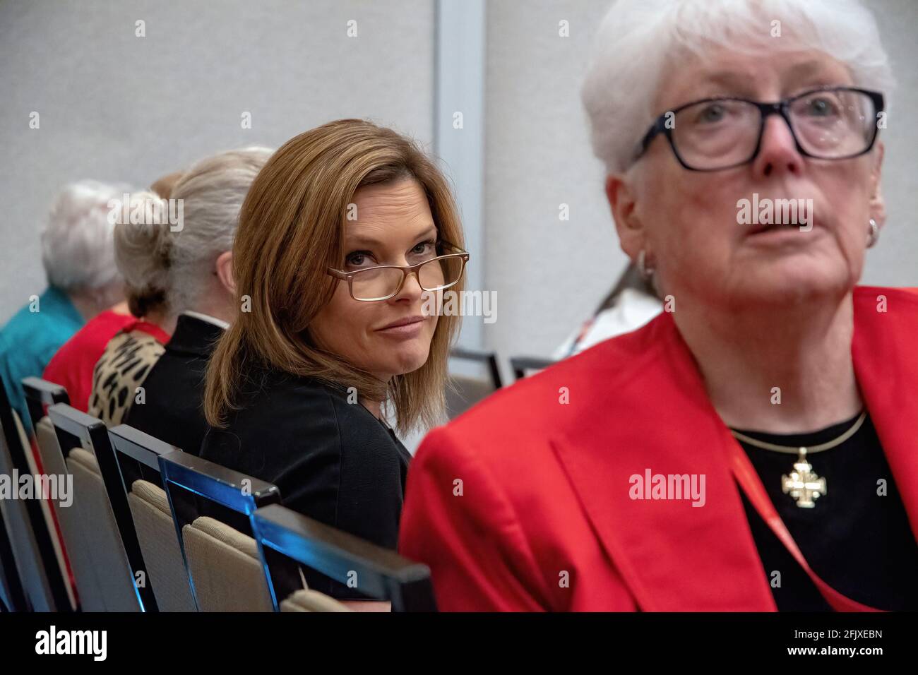 Mercedes Schlapp reads over brochure while attending state district ...