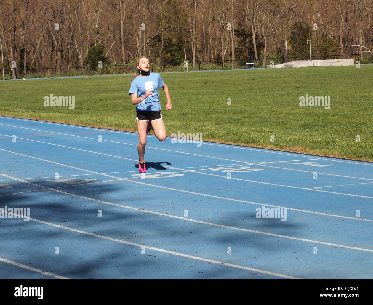 Young girls participating in a Middle school track meet in Sussex ...