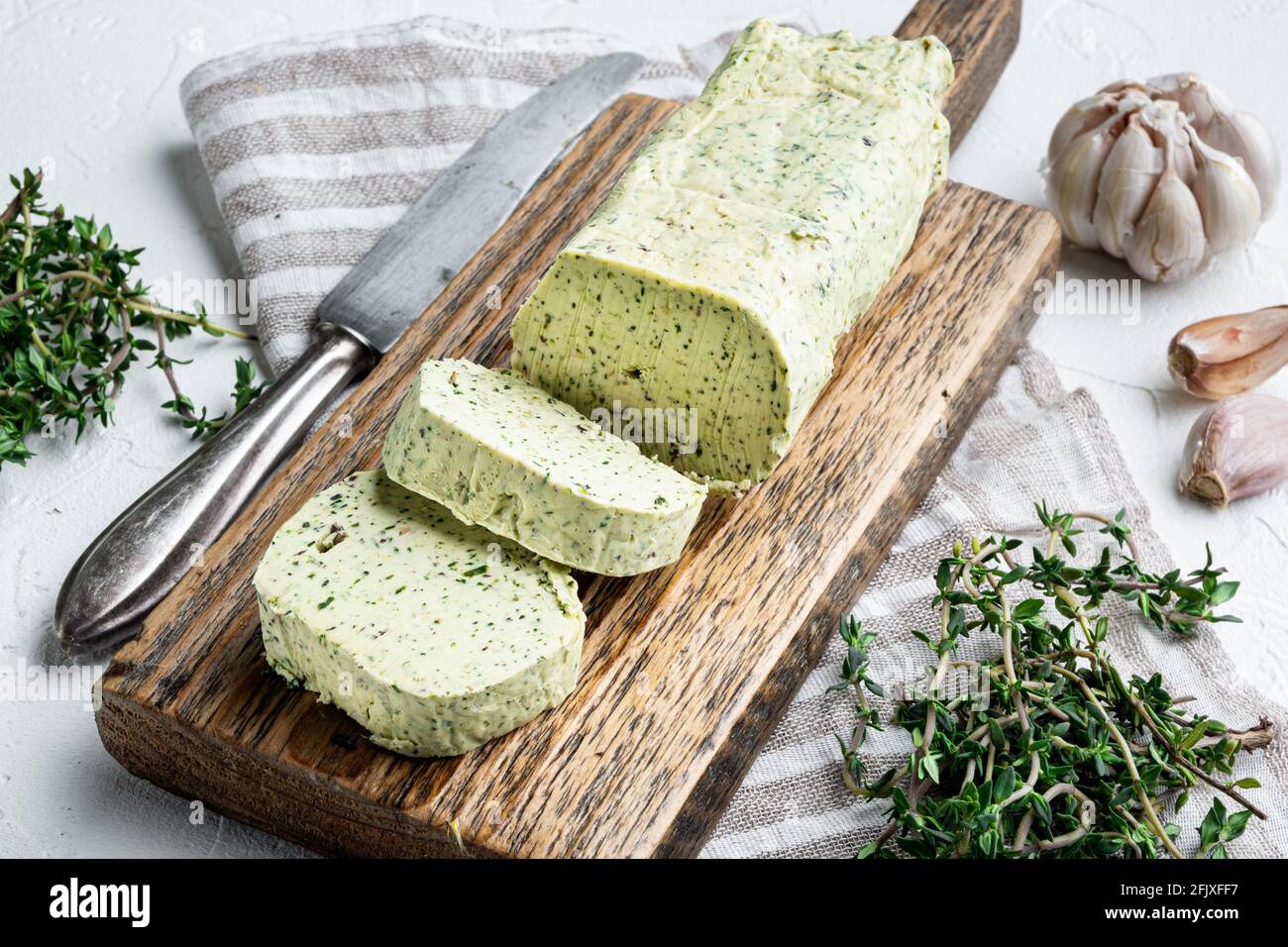 Dairy green butter with herbs set, on white stone background Stock ...