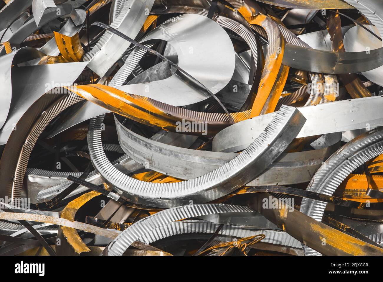 Metal waste with rust traces, steel trash pile background close up ...