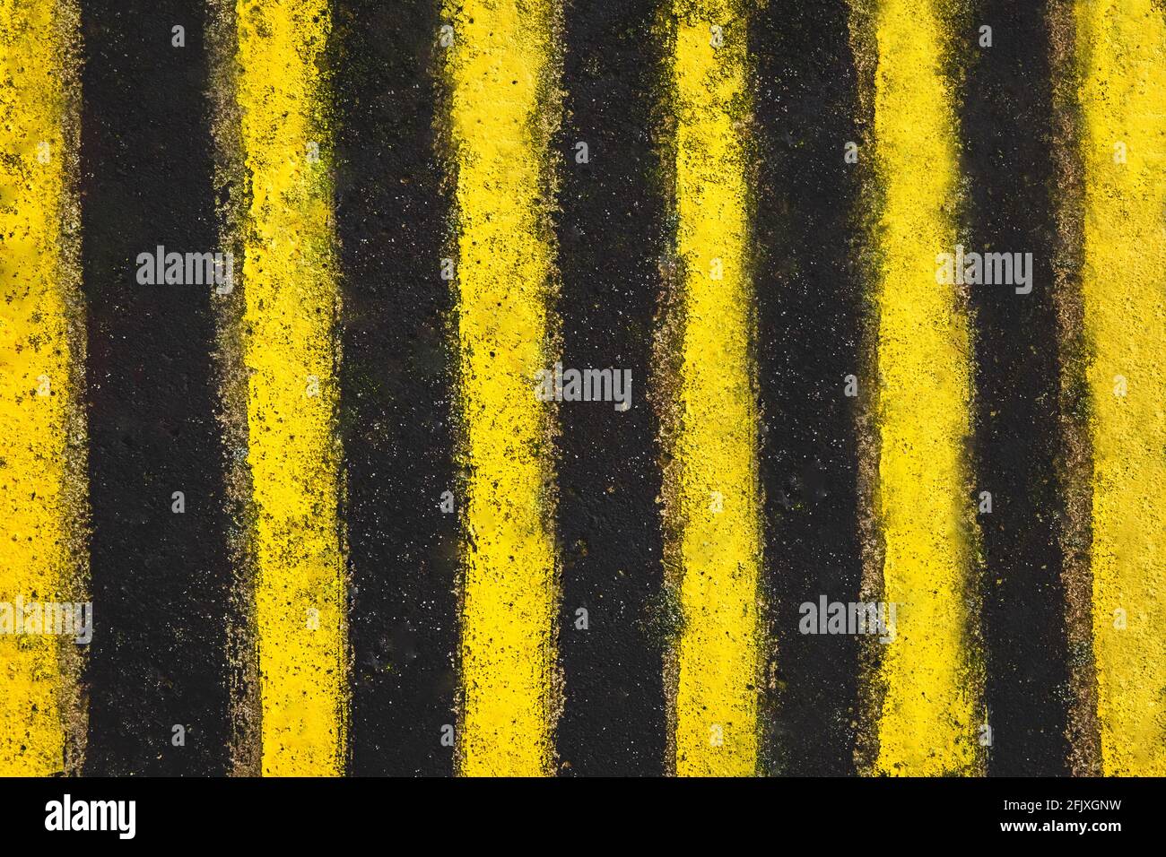 Hazardous restricted area designation, black and yellow vertical lines ...