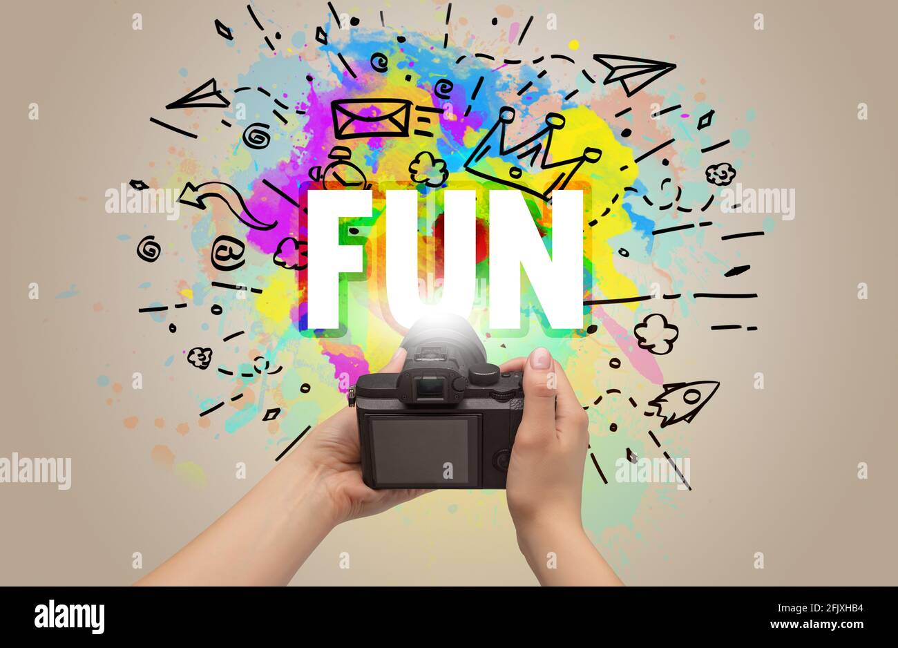 Close-up of a hand holding digital camera with abstract drawing Stock ...