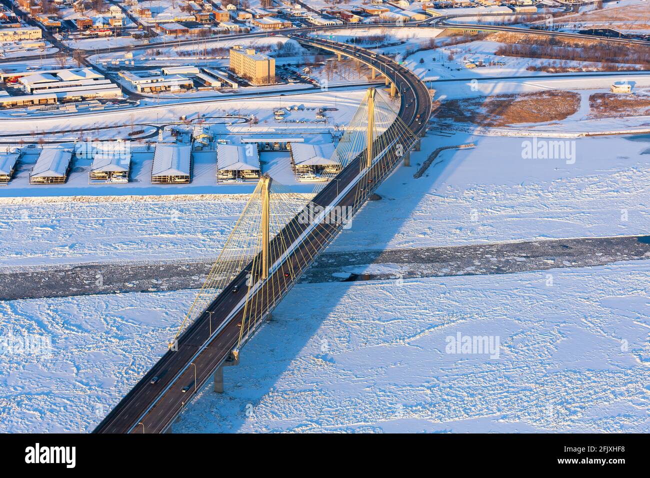 Aerial view of Clark Bridge over frozen Mississippi River near Alton ...