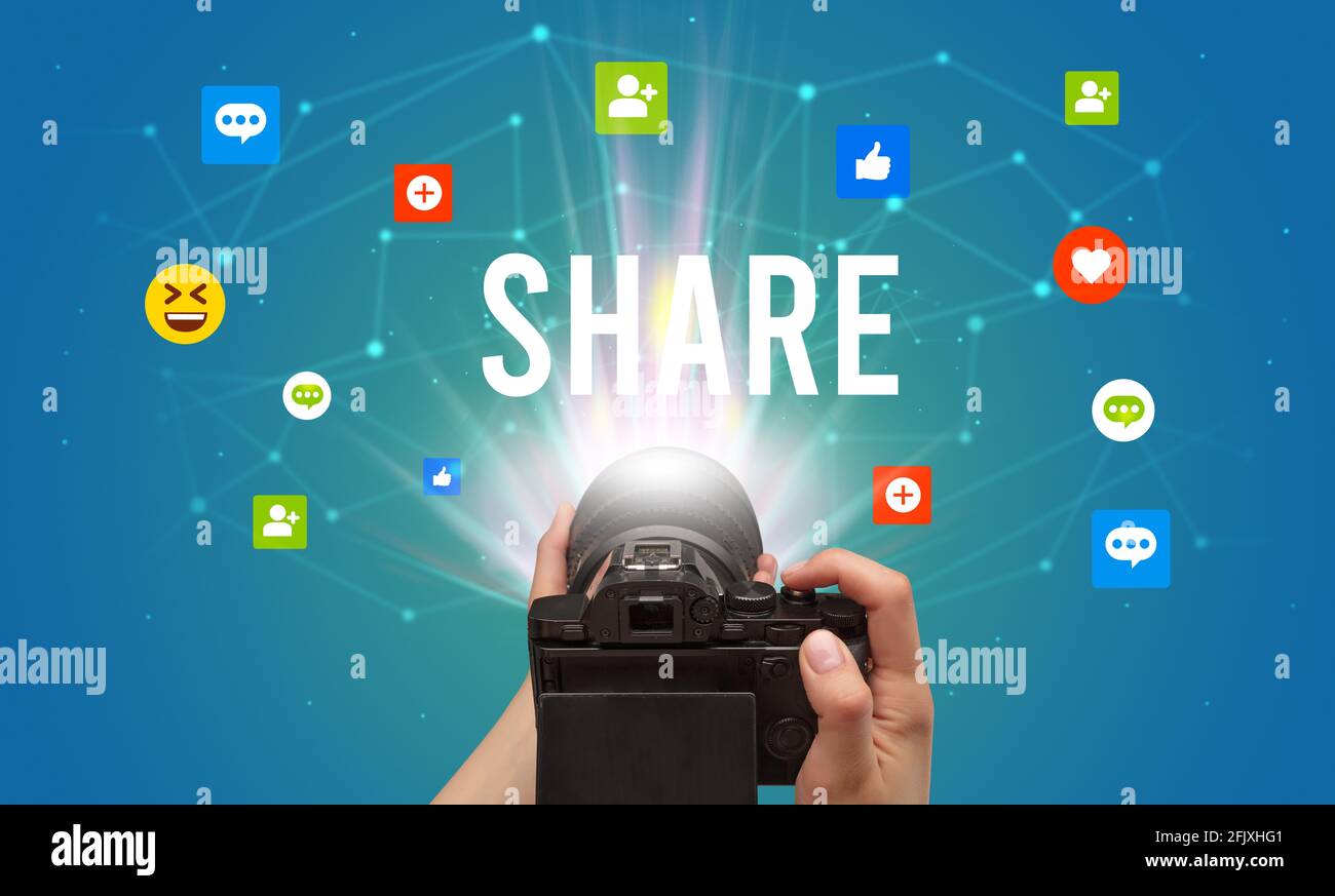 Using camera to capture social media content Stock Photo - Alamy