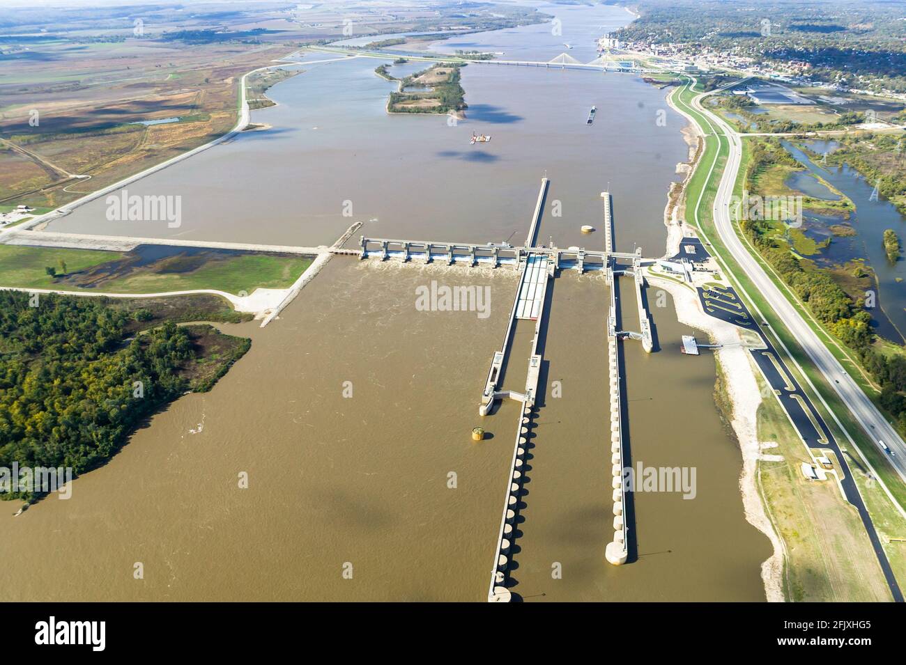 Aerial view of Mississippi River flood passing over Melvin Price locks ...