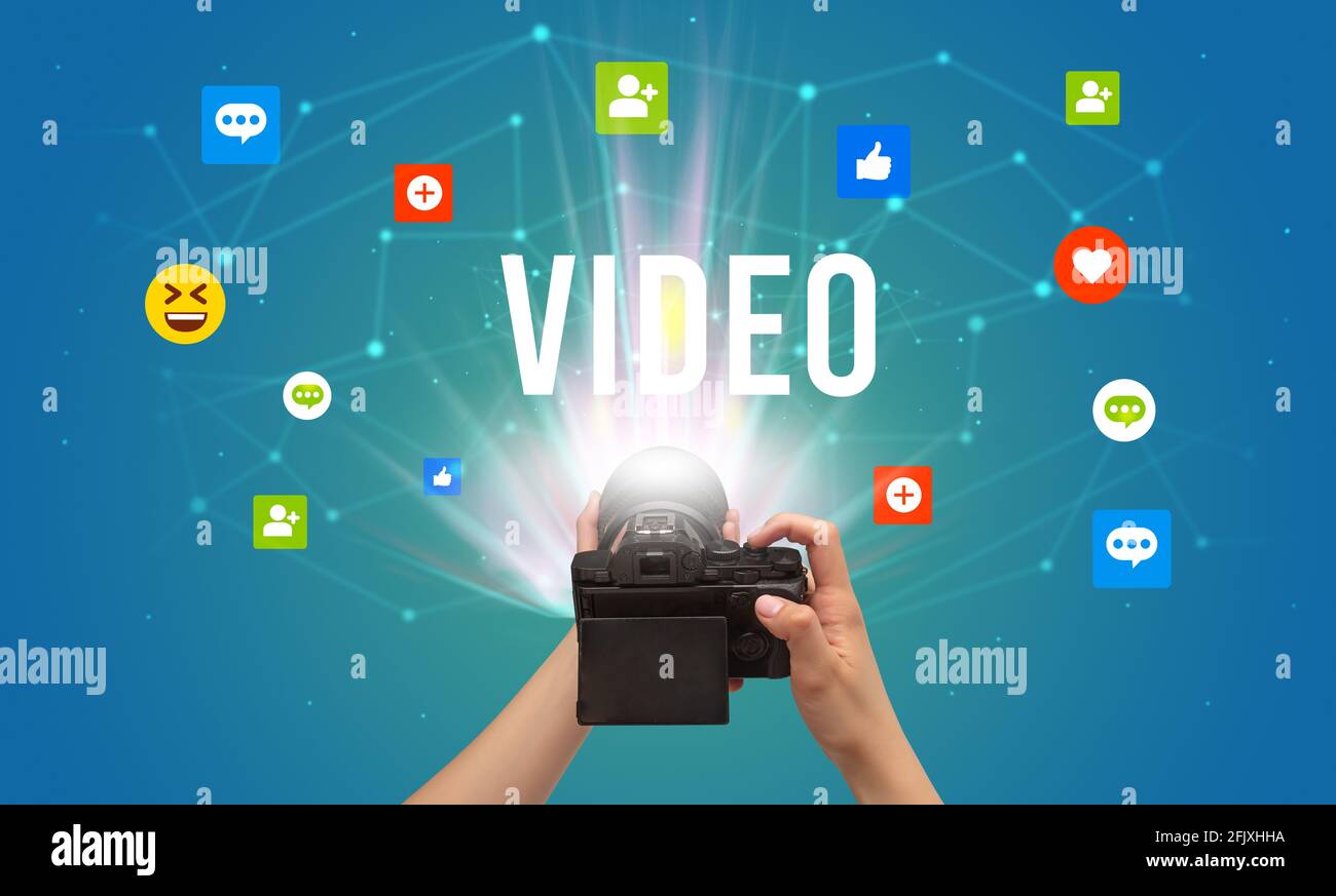Using camera to capture social media content Stock Photo - Alamy