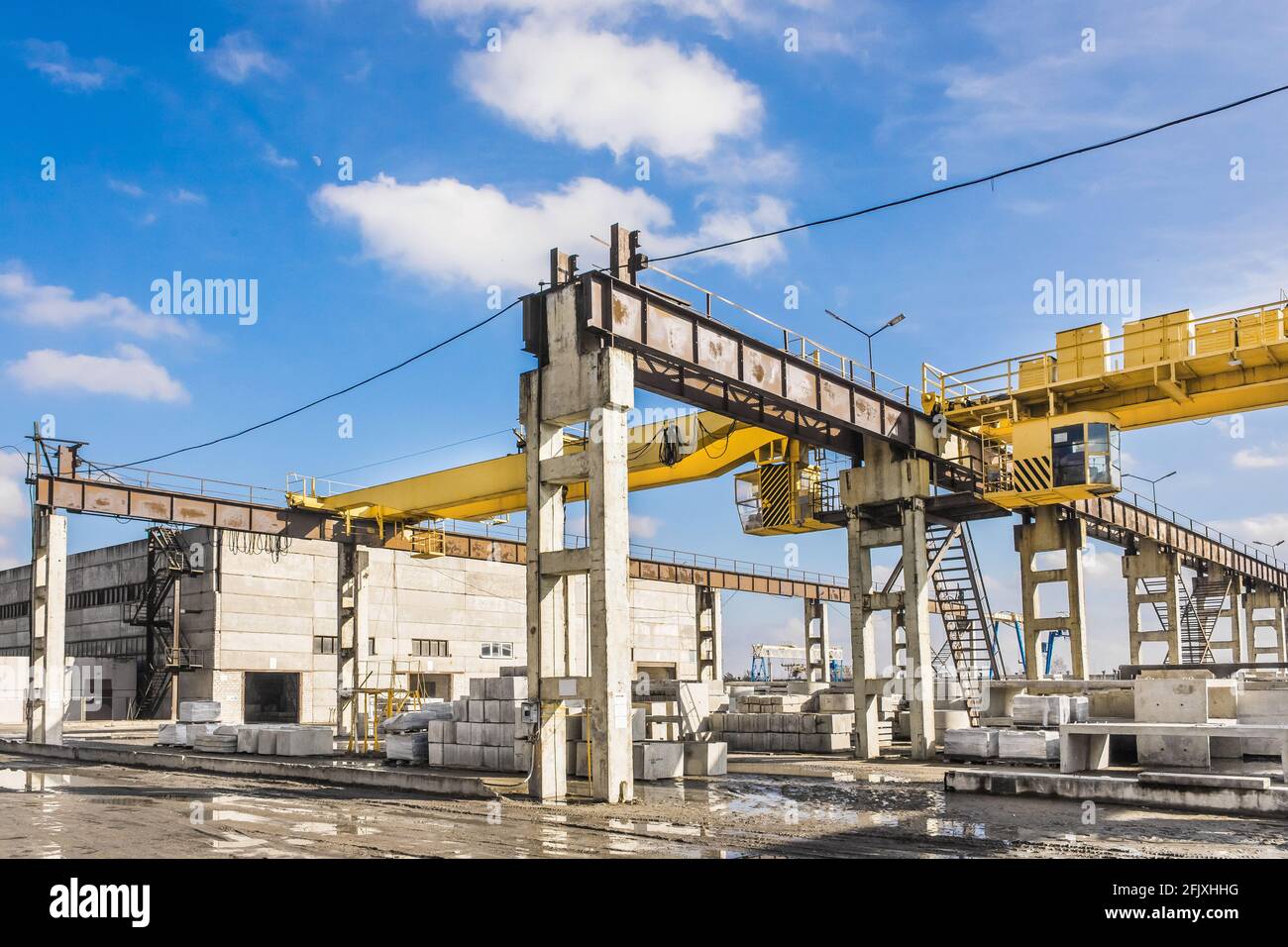 Industrial area with construction equipment and outdoor storage of ...