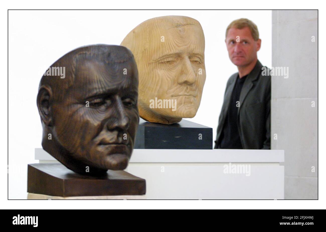 Andrew Motion Poet Laureate June 2001with the two sculptures of himself ...