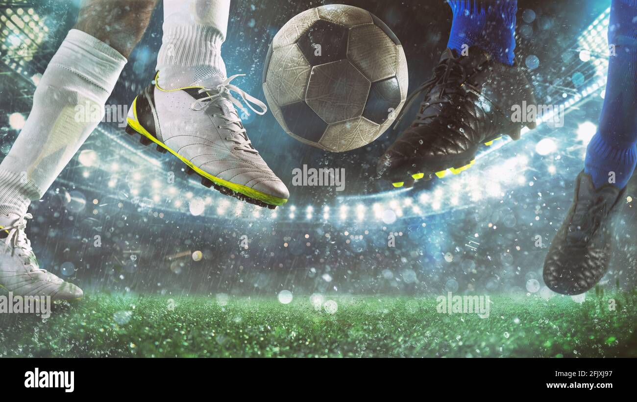 Close up of a football action scene with competing soccer players at ...