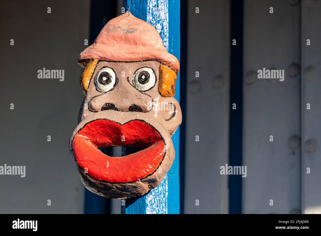 Mask decoration on column, Museo el Carnaval, Santiago de Cuba, Cuba ...
