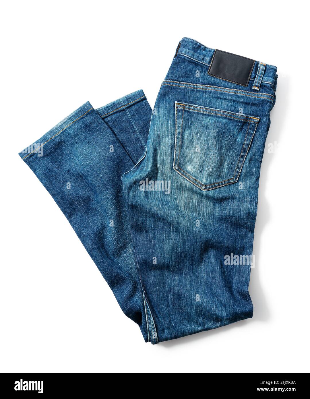 Blue jeans on a white background. View from above Stock Photo - Alamy