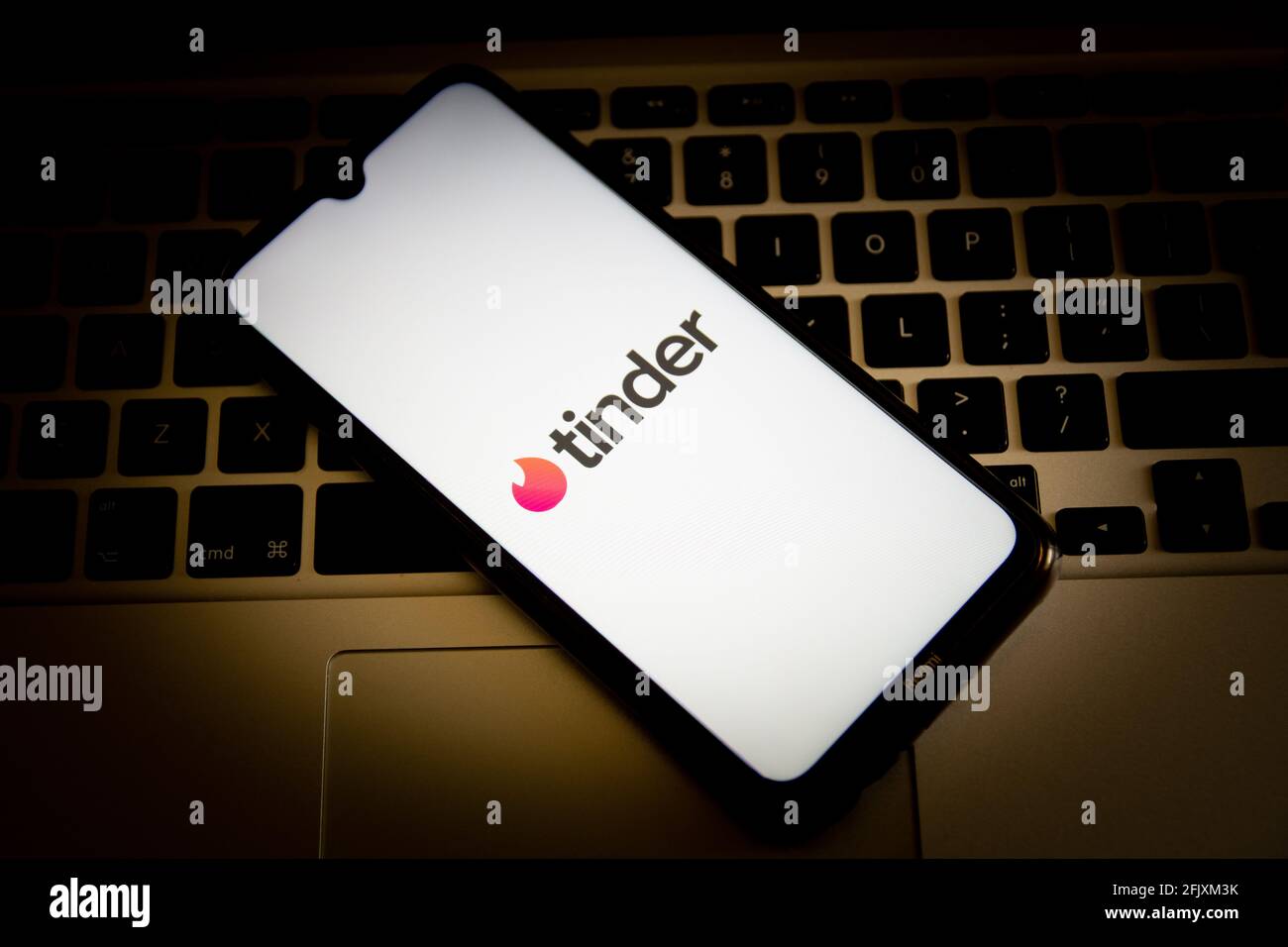 In this photo illustration, a Rolex logo seen displayed on a smartphone ...